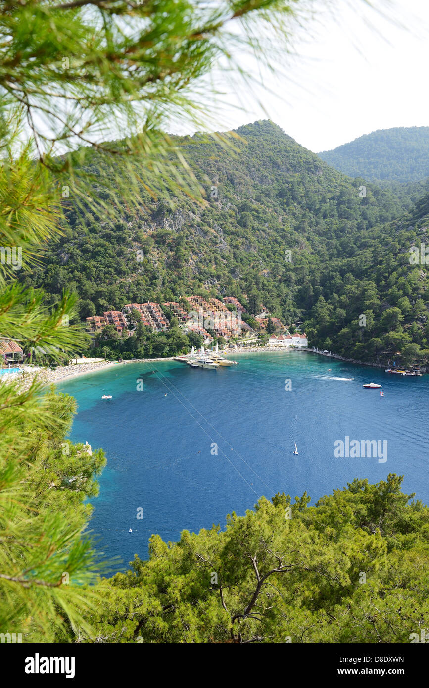 Yachts at the pier and beach on Mediterranean turkish resort, Fethiye ...