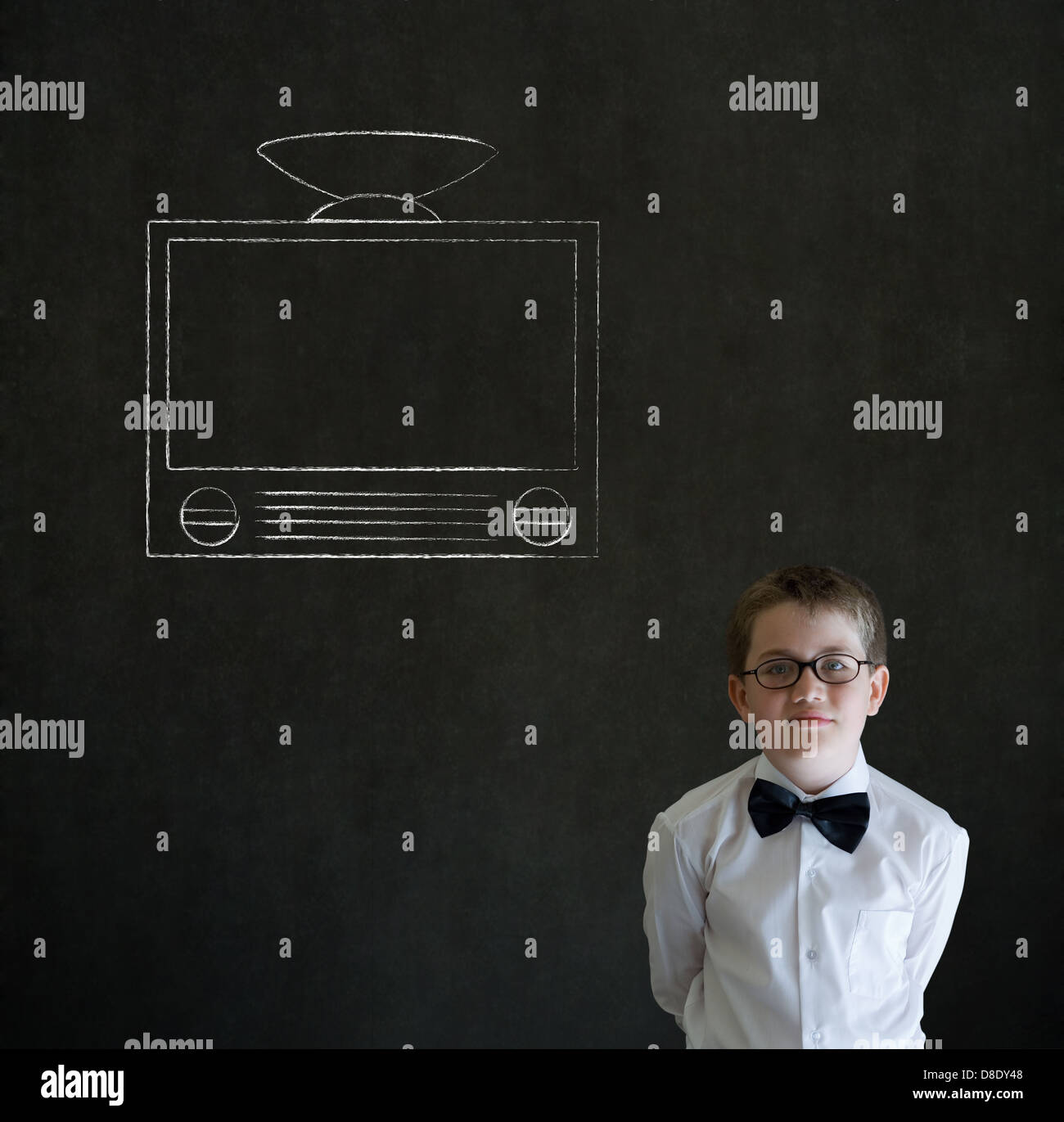 Thinking boy dressed up as business man with chalk tv television on ...