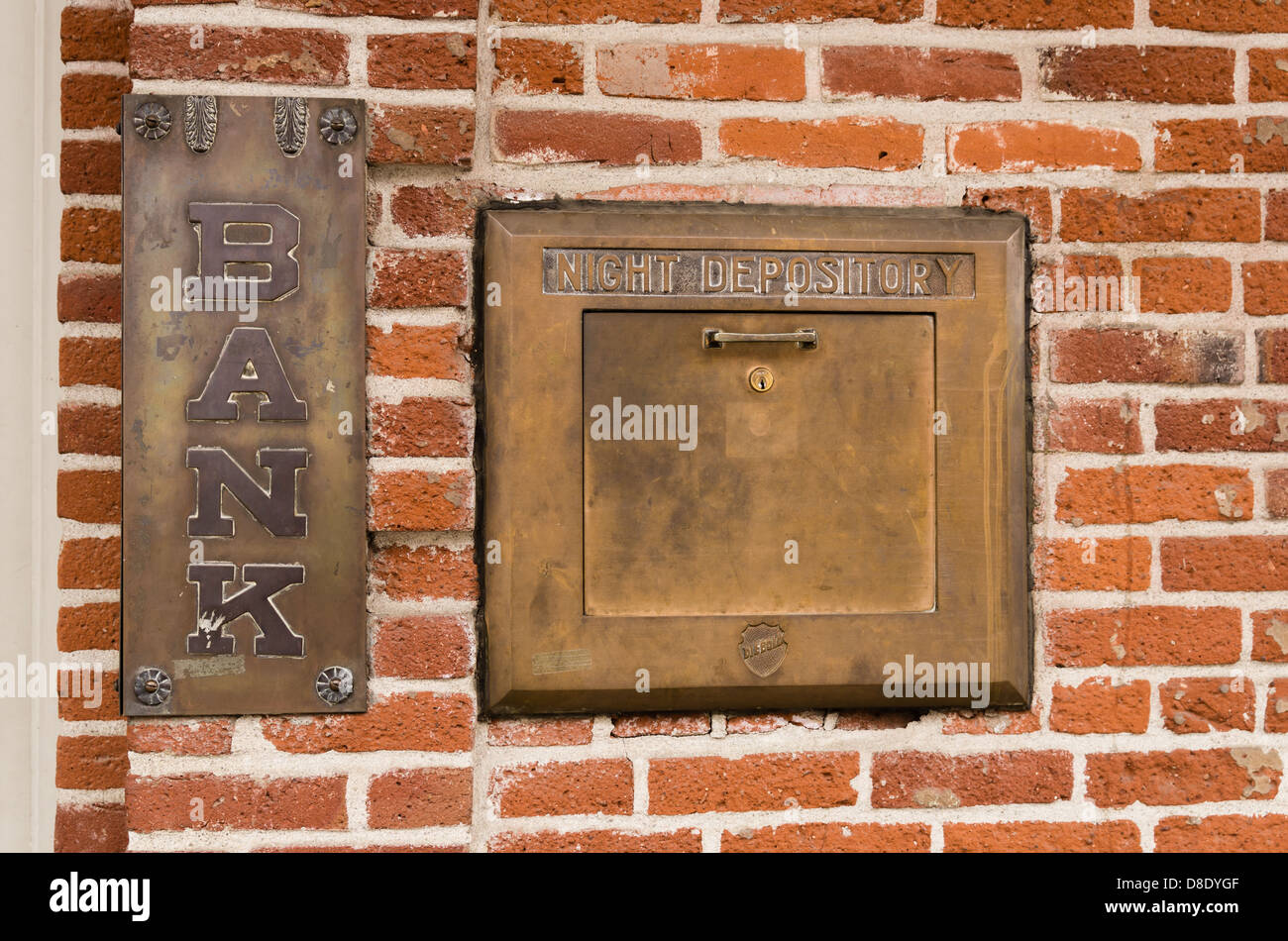 Jacksonville, Oregon, USA. Brass bank sign and night depository on ...