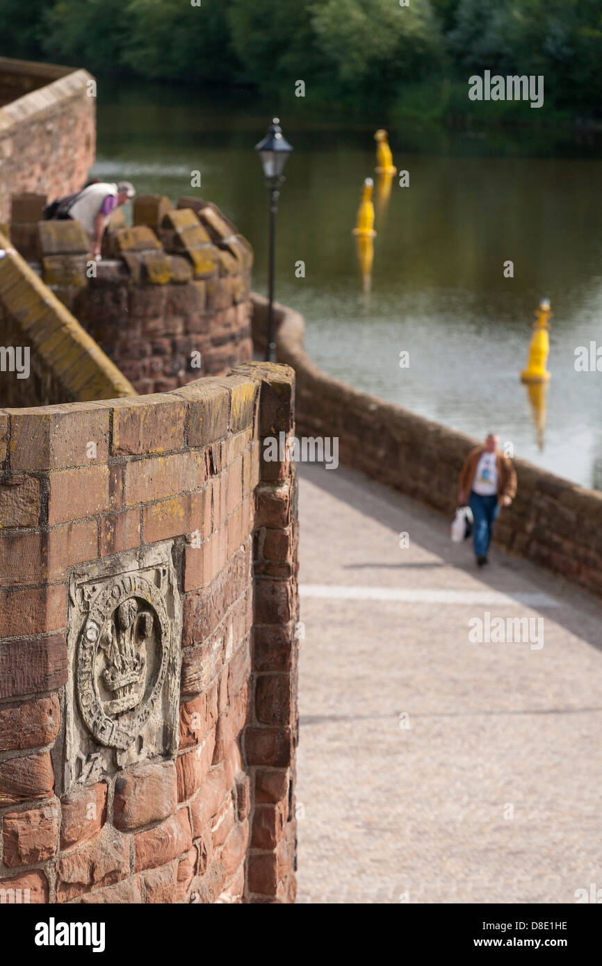 A tower looks over the worn paths of the Roman wall that surrounds ...