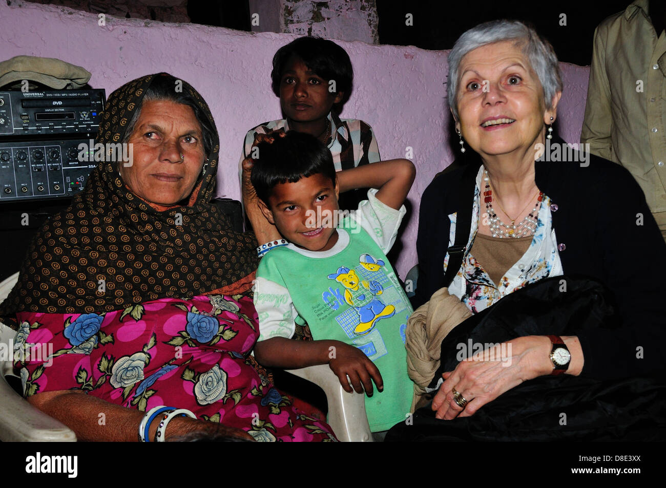 Italian lady at the party of Indian family Stock Photo - Alamy