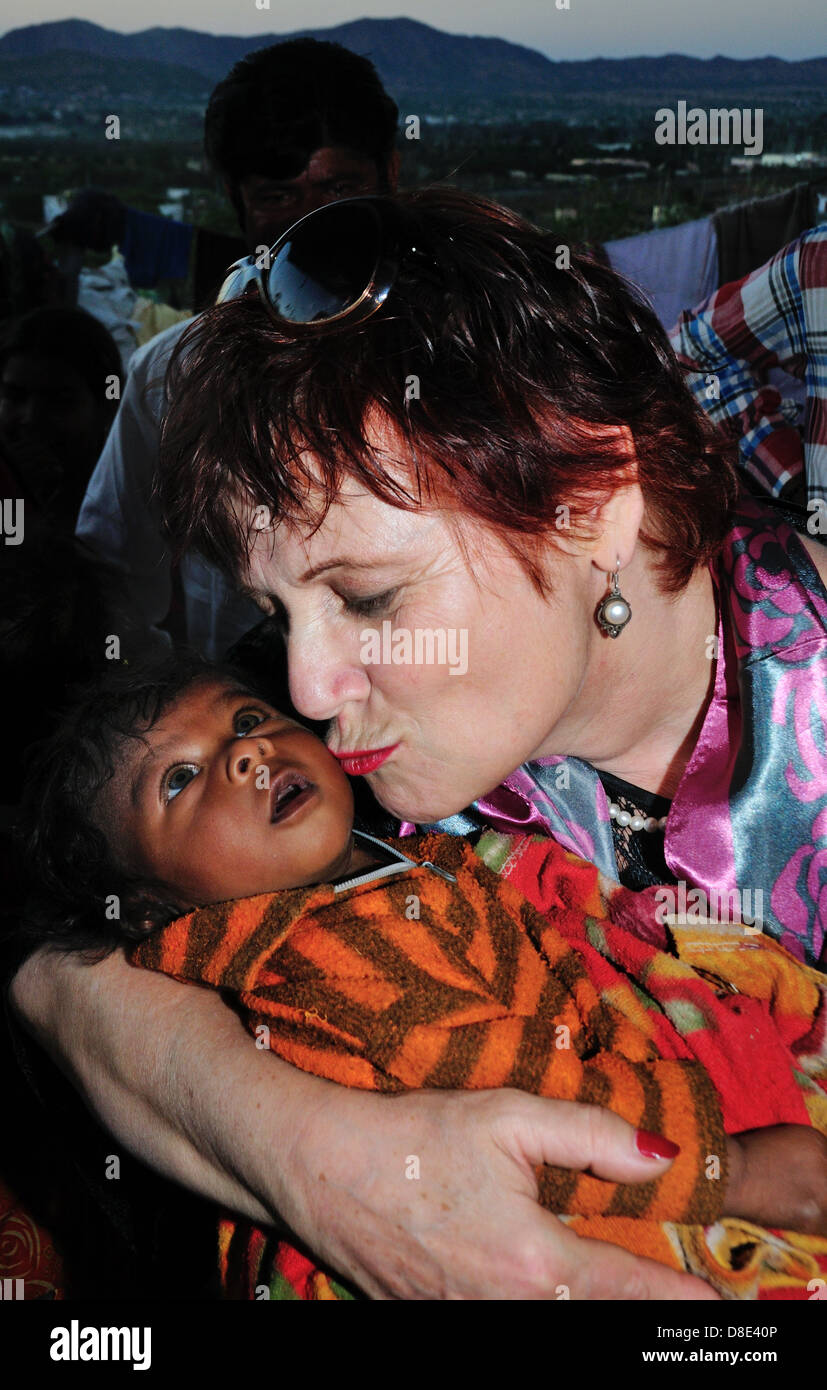 Italian lady holding Indian boy. She has deep friendship with Indian ...
