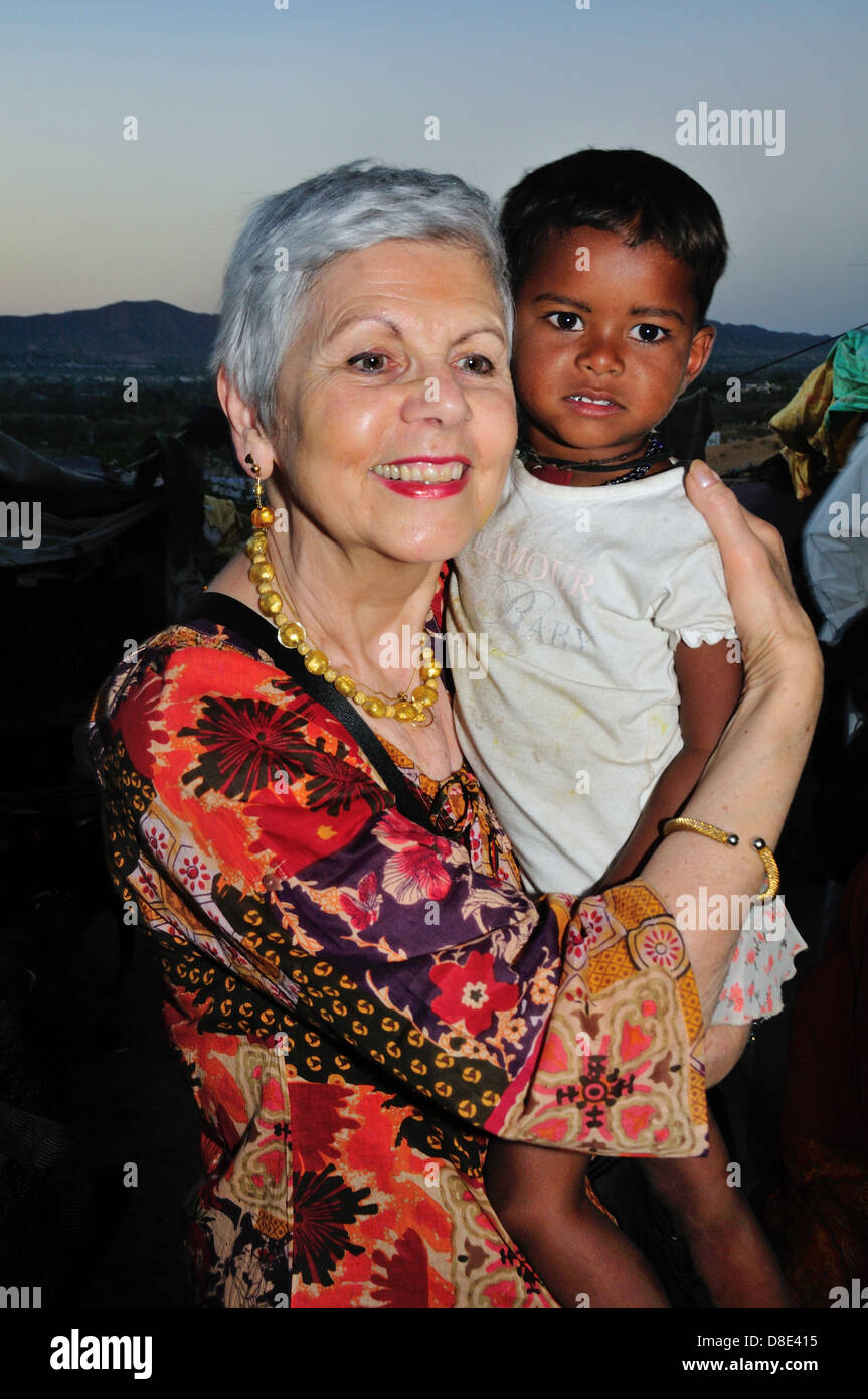 Italian lady holding Indian boy. She has deep friendship with Indian ...