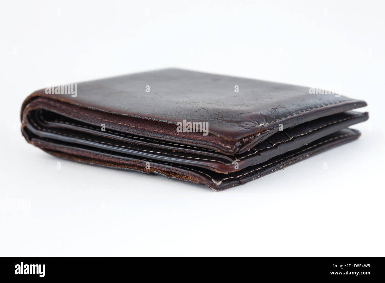 A brown wallet isolated on white background Stock Photo - Alamy