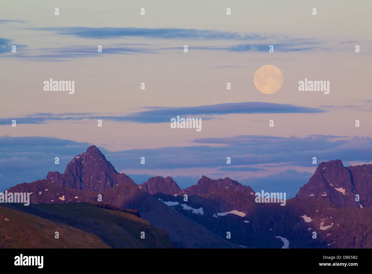 Full moon over sharp mountain peaks on Lofoten islands in Norway Stock ...