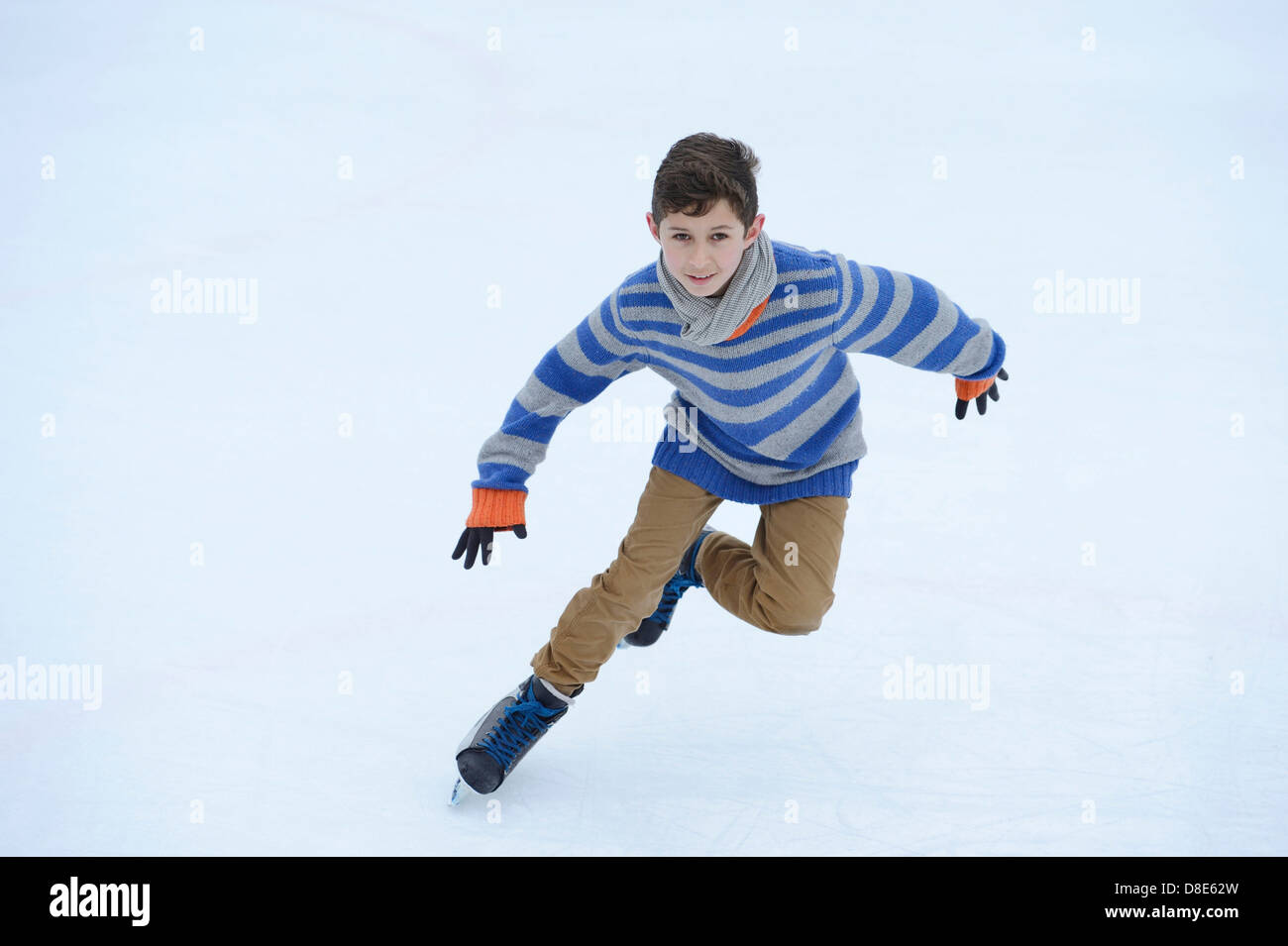 Child ice skating hi-res stock photography and images - Alamy