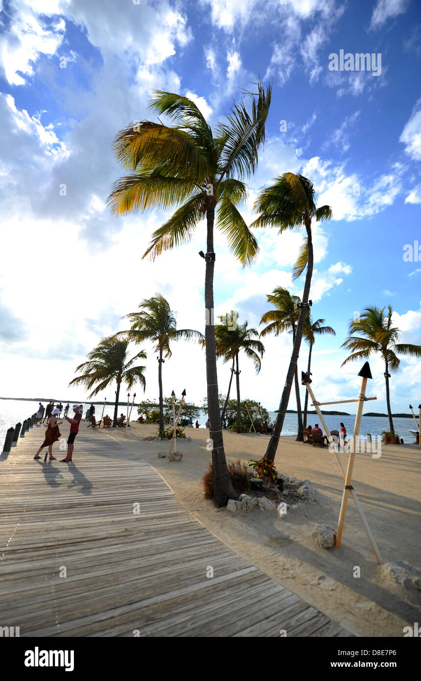 Tourists relax at a beach esplanade at Florida Keys in Islamorada ...