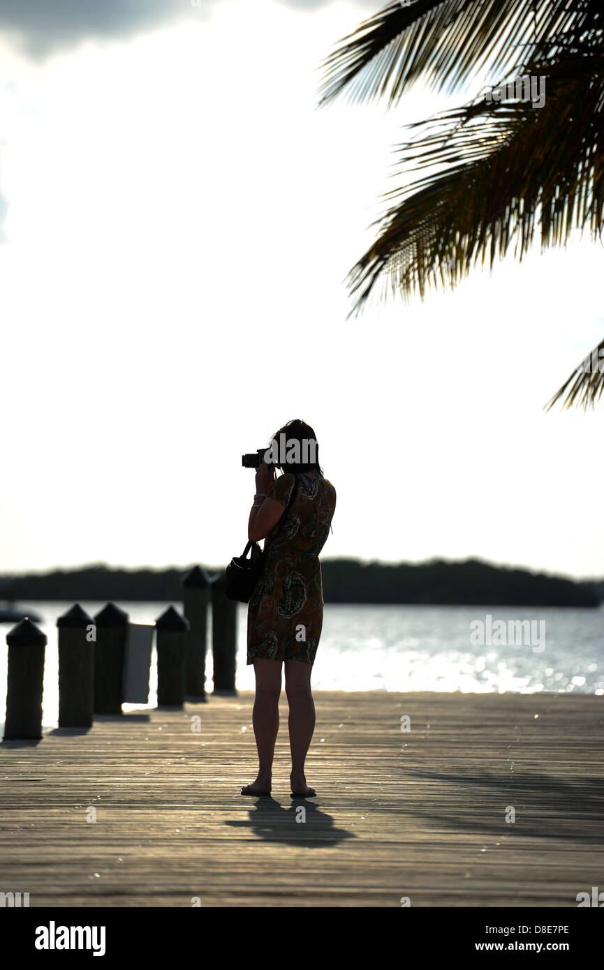 Tourists relax at a beach esplanade at Florida Keys in Islamorada ...