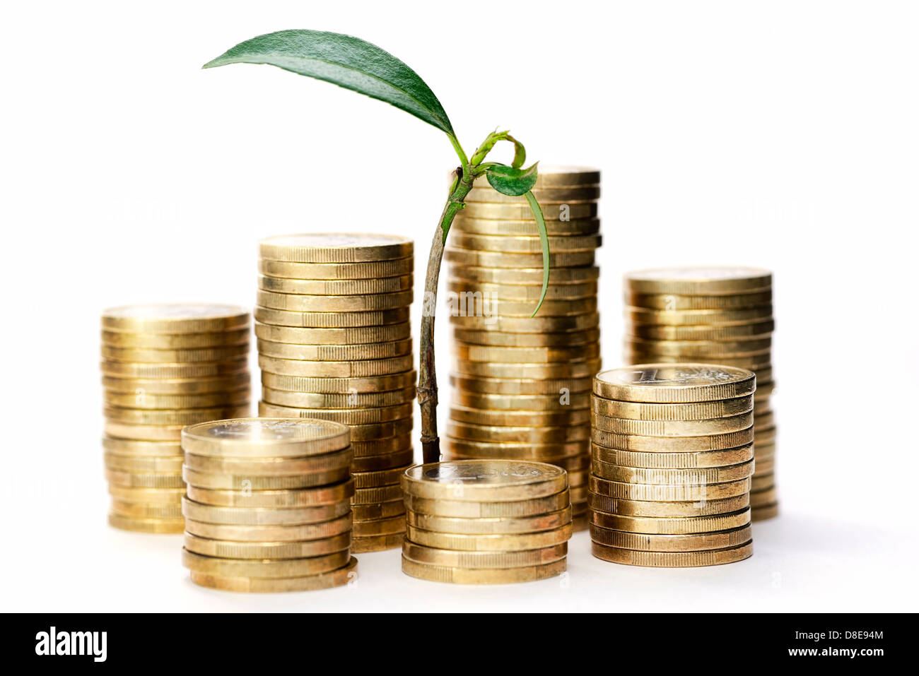 Green money coins plant hi-res stock photography and images - Alamy