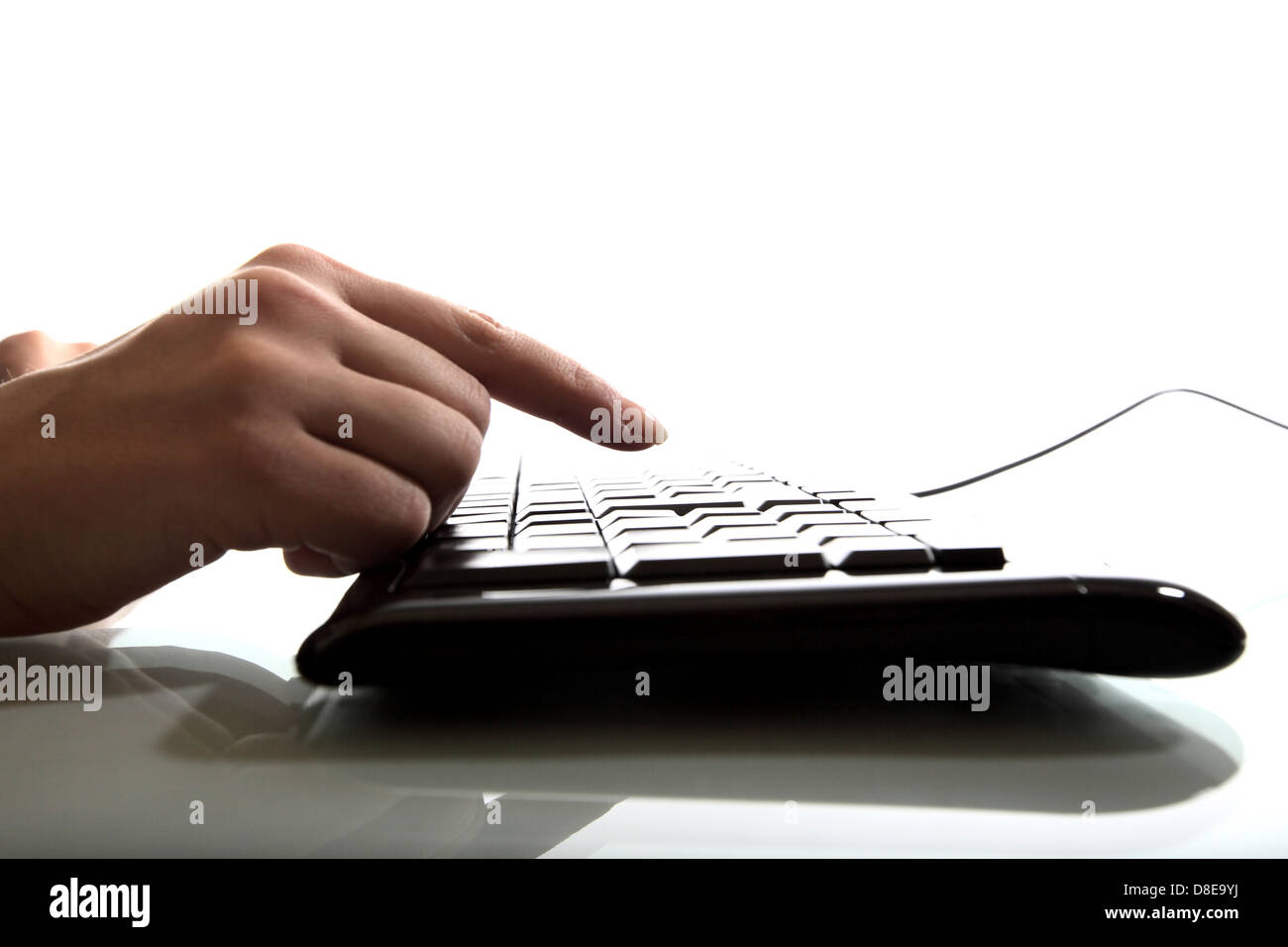 hand press a key on keyboard Stock Photo - Alamy