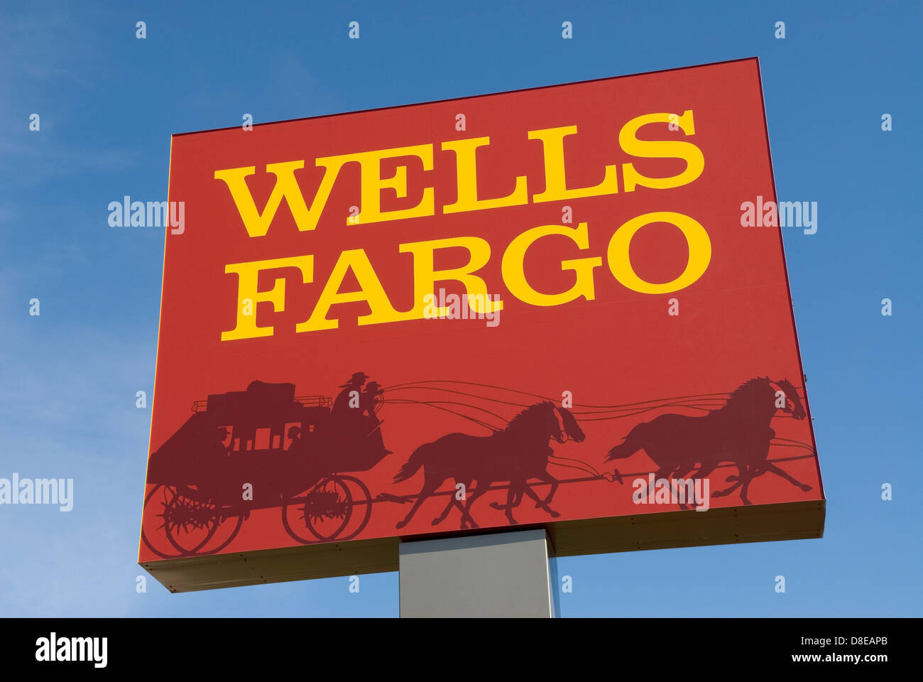 Wells Fargo sign on display at a retail banking branch in the United ...