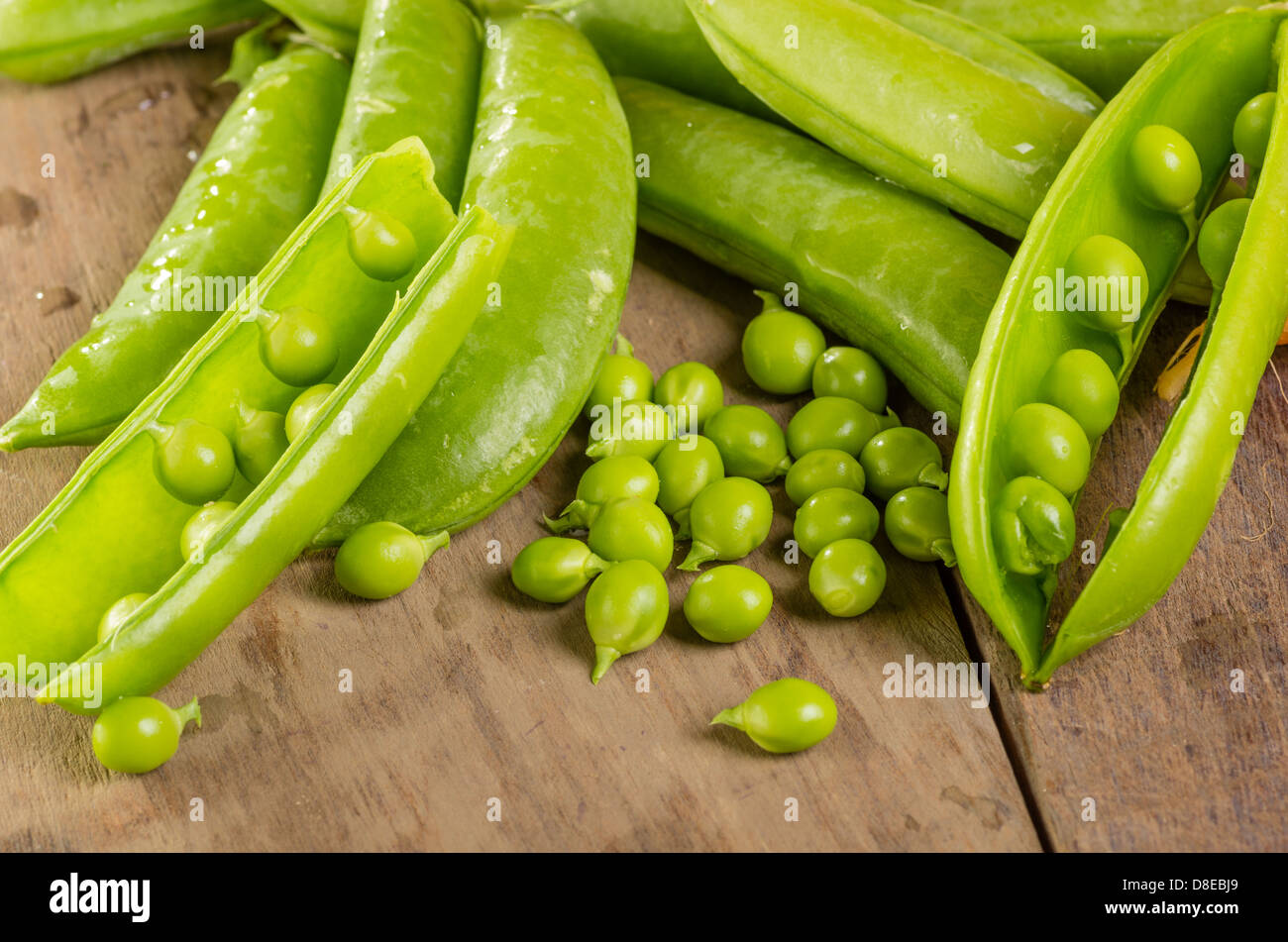 Freshly harvested shelled green peas Stock Photo - Alamy