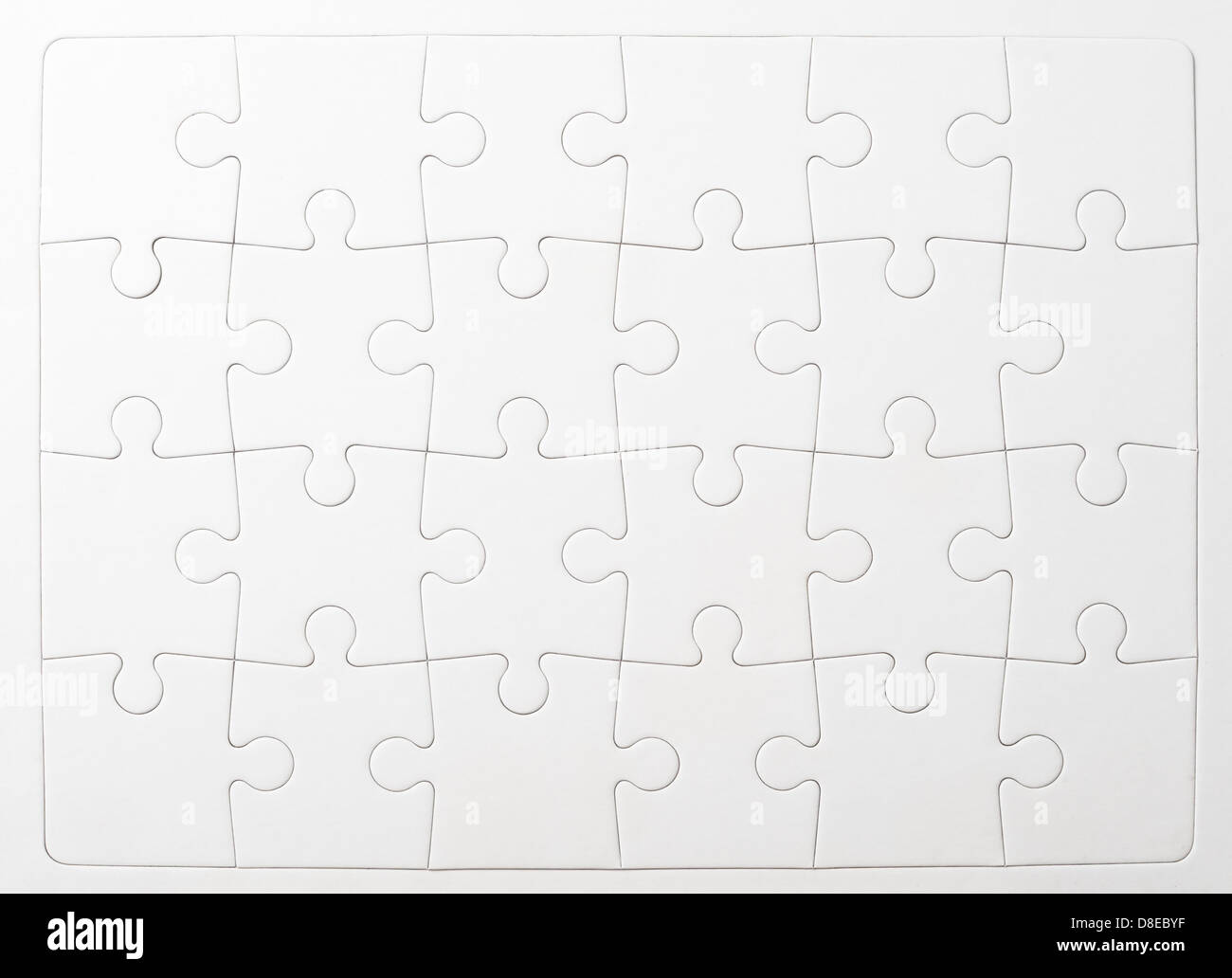 Group of white paper jigsaw puzzles Stock Photo - Alamy