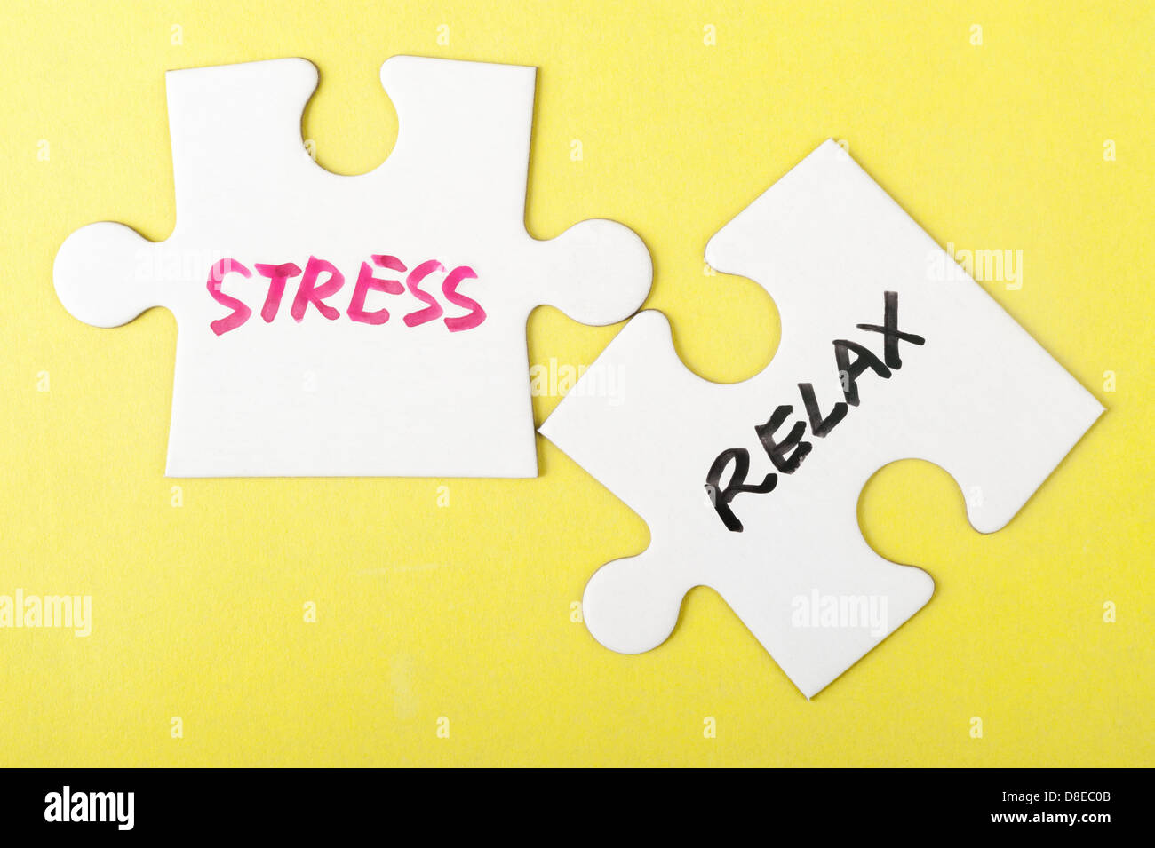 Stress and relax words written on two pieces of jigsaw puzzle Stock ...