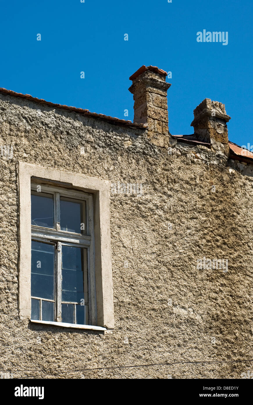 window and chimney of old house from Macedonia Stock Photo - Alamy