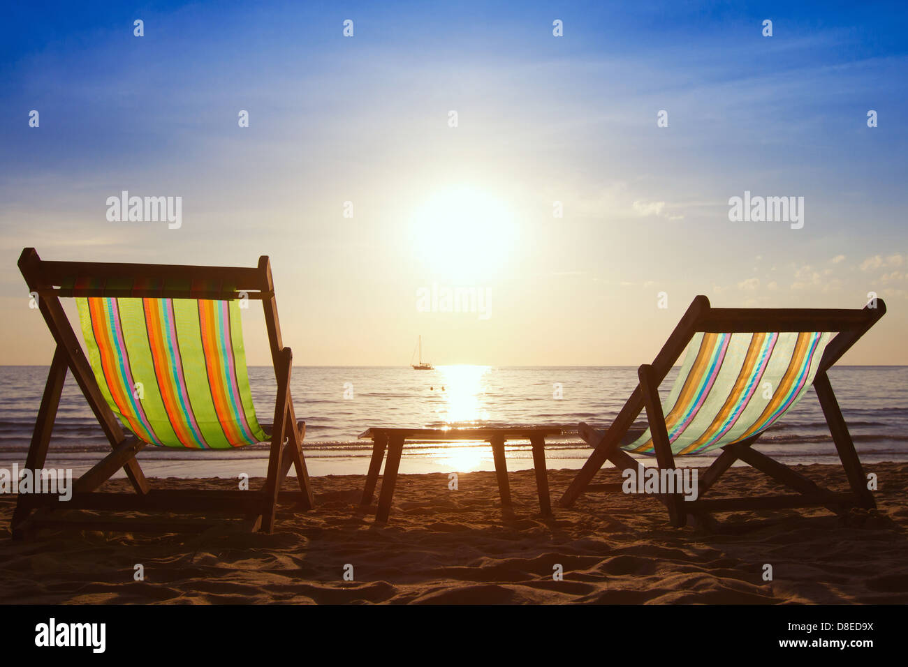 Beach chairs sunset on beach hi-res stock photography and images - Alamy