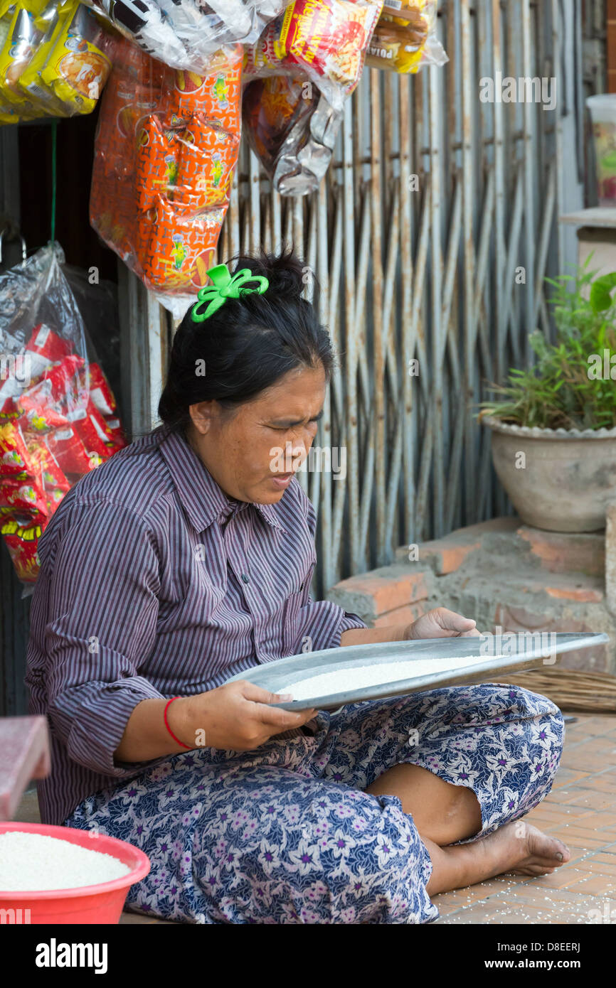 Woman selling Rice in the Street in Phnom Penh, Cambodia Stock Photo ...