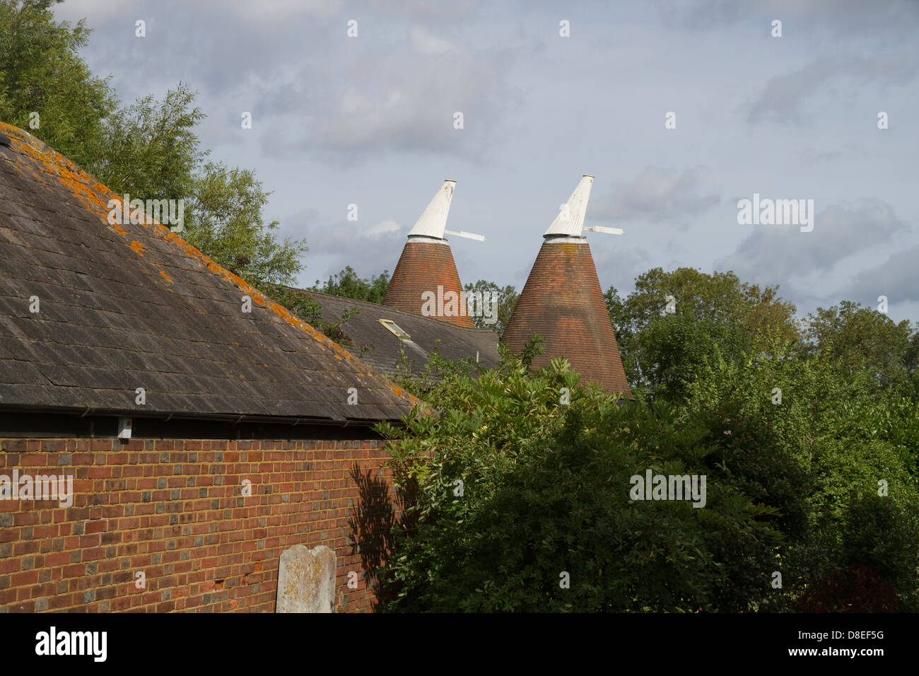 Converted oast houses in Kent England Stock Photo - Alamy
