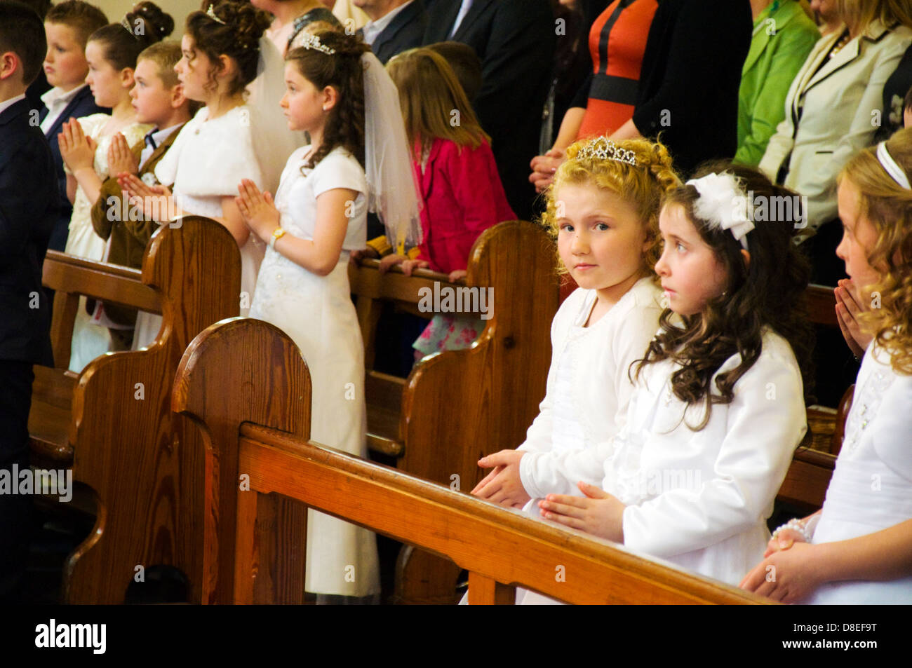 Children at a First Communion Mass Stock Photo - Alamy