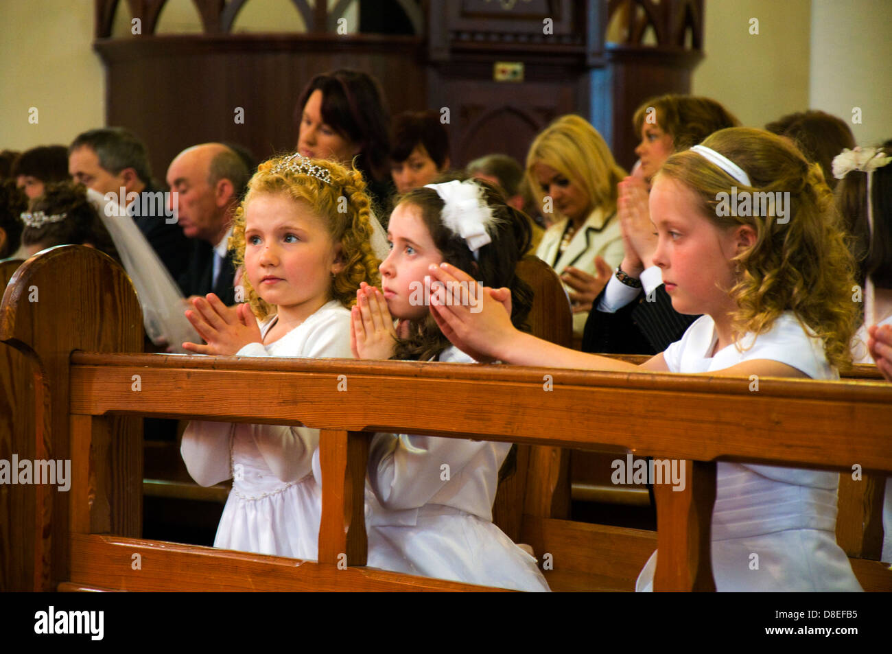 Children at a First Communion Mass Stock Photo - Alamy