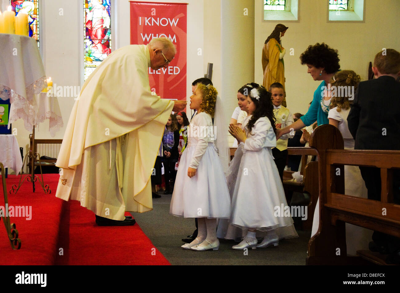 Children at a First Communion Mass Stock Photo - Alamy