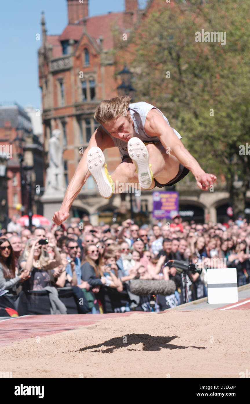 Chris Tomlinson competing in the long jump at the BT Great City Games ...