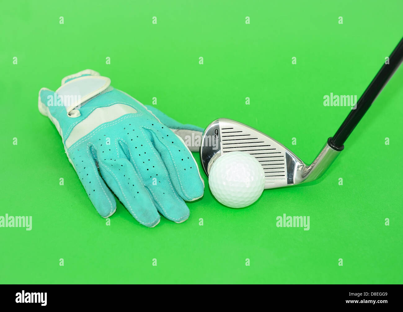 metal golf driver and glove Stock Photo - Alamy