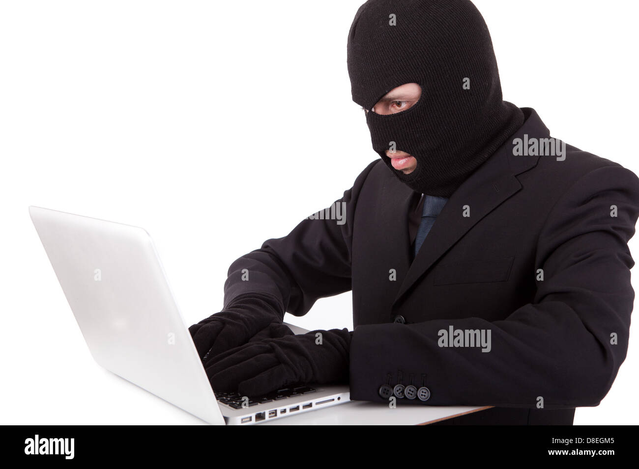 Computer hacker in suit and tie Stock Photo - Alamy