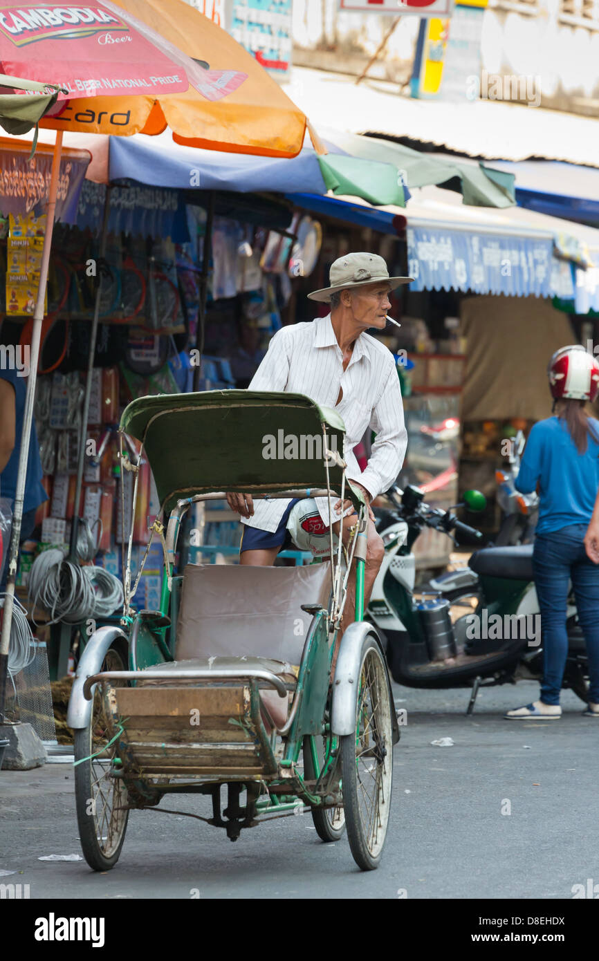 Rickshaw Driver in Phnom Penh, Cambodia Stock Photo - Alamy