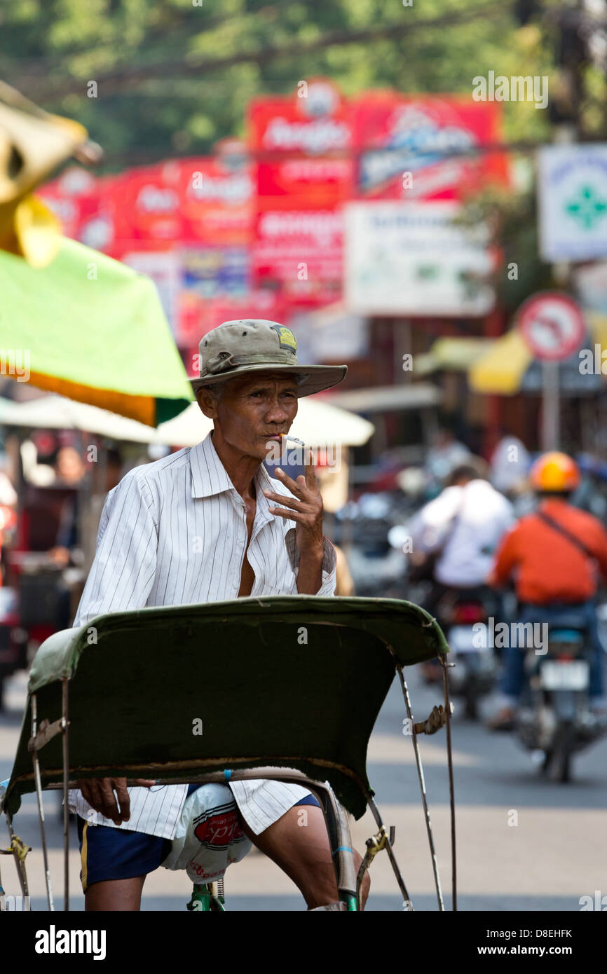 Rickshaw Driver in Phnom Penh, Cambodia Stock Photo - Alamy