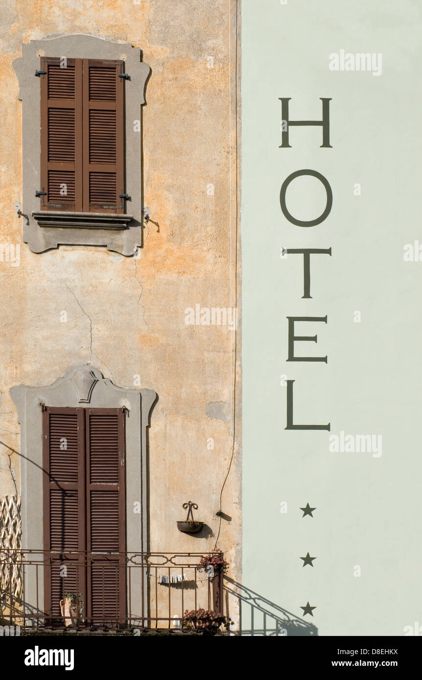 Hotel sign painted on wall Stock Photo - Alamy