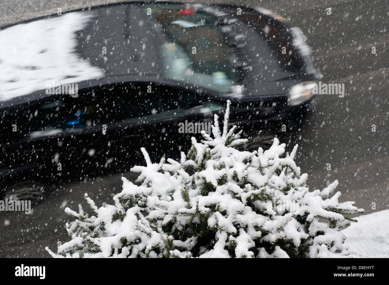 Snow flakes and car Stock Photo - Alamy