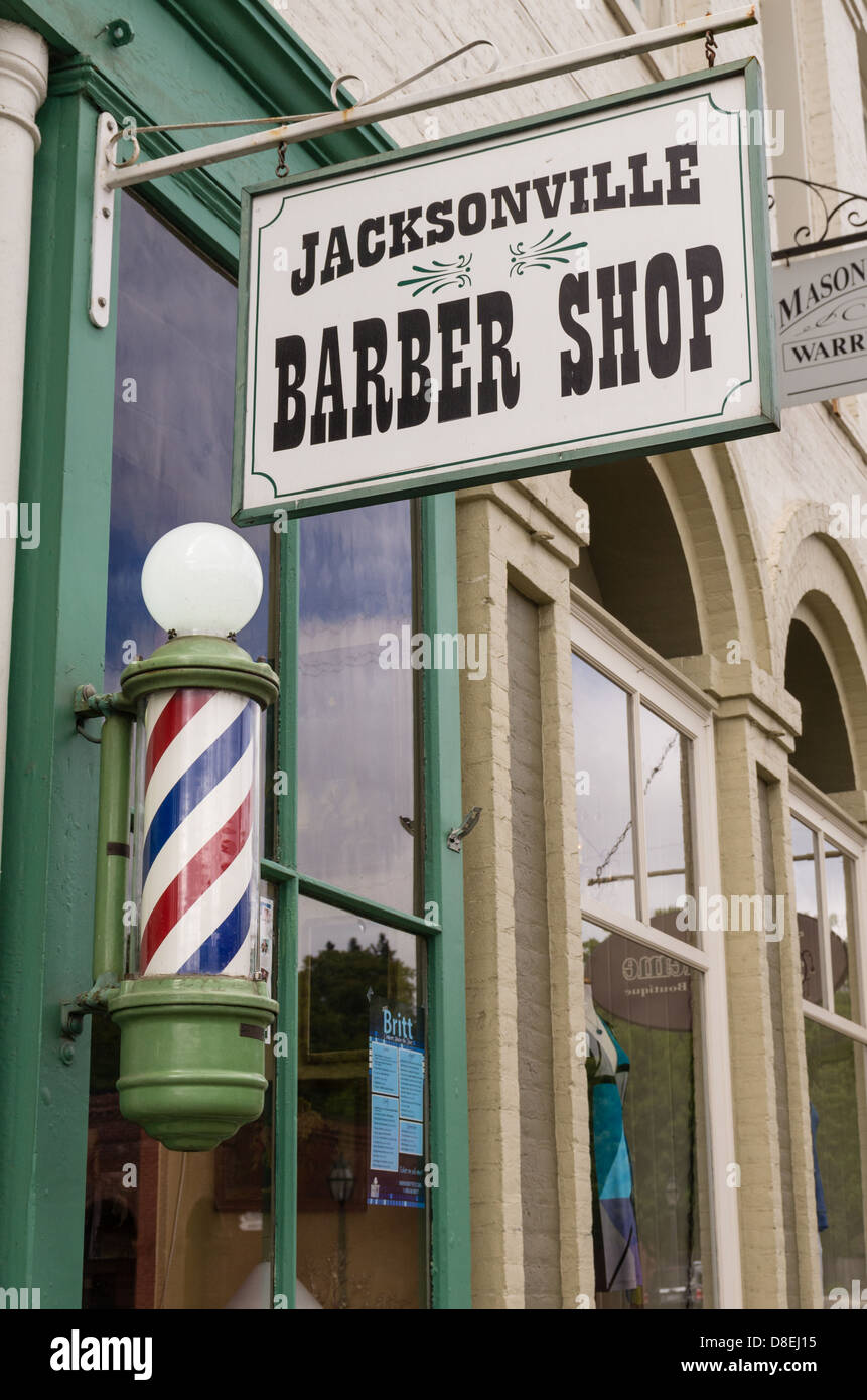 Jacksonville, Oregon, USA. Street signs advertising for businesses in ...