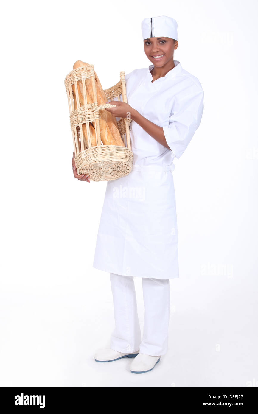 A baker showing off her bread Stock Photo - Alamy