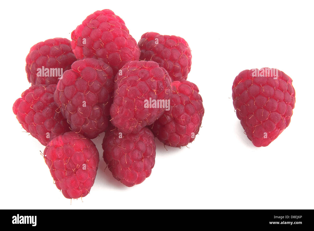 cut fresh and juicy raspberries on white background Stock Photo - Alamy