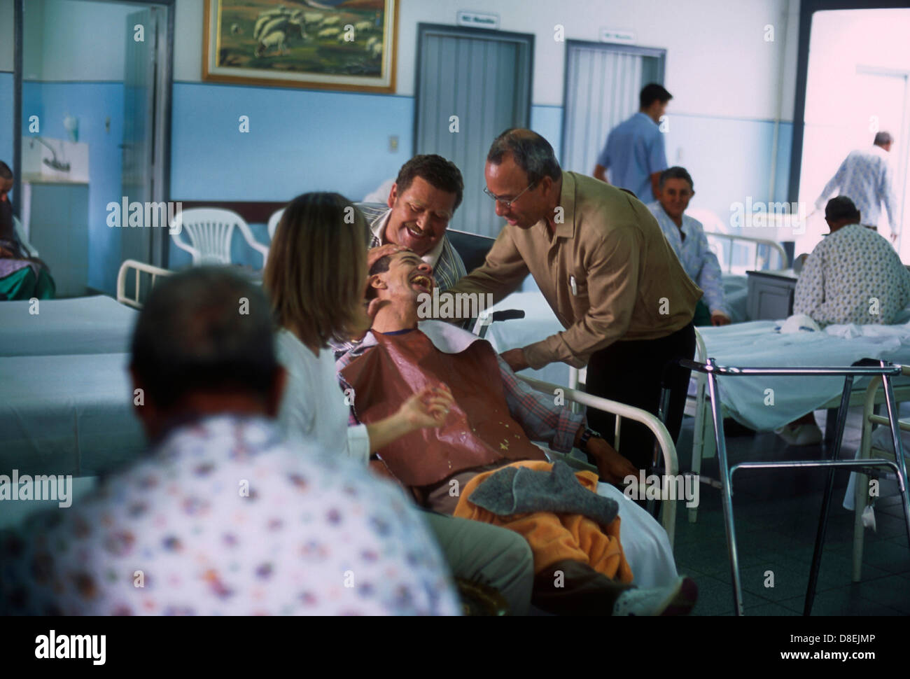 Handicapped patient cared by nurses and volunteers, social work Stock ...