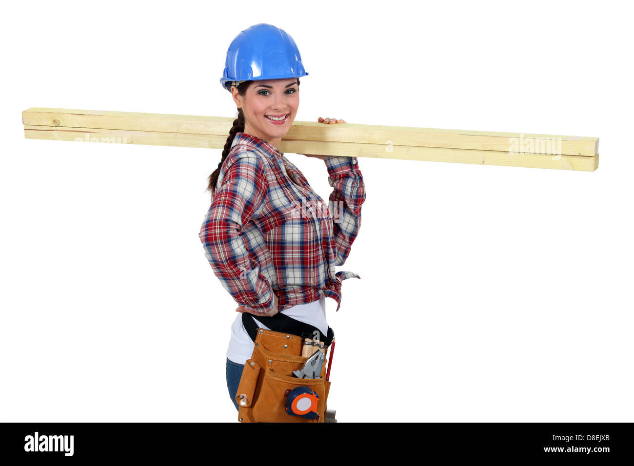 Woman with strips of wood on her shoulder Stock Photo - Alamy