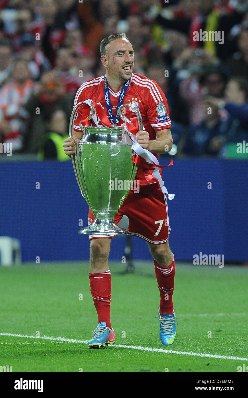 Munich's Franck Ribery celebrates with the Champions League trophy ...