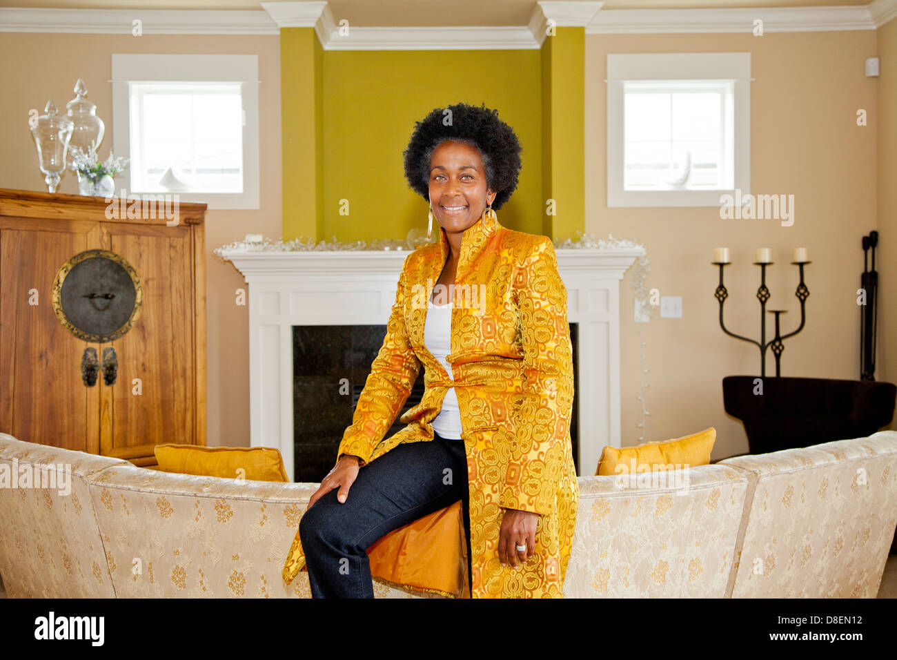 Elegant woman in formal living room Stock Photo - Alamy