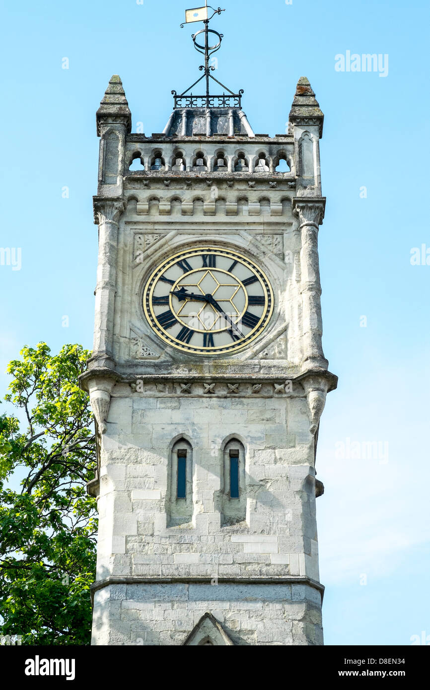 Looking up at old stone clock tower Stock Photo - Alamy