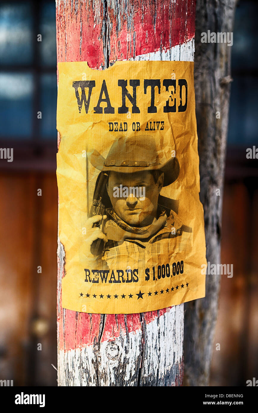vintage wanted poster in a gost town Stock Photo - Alamy