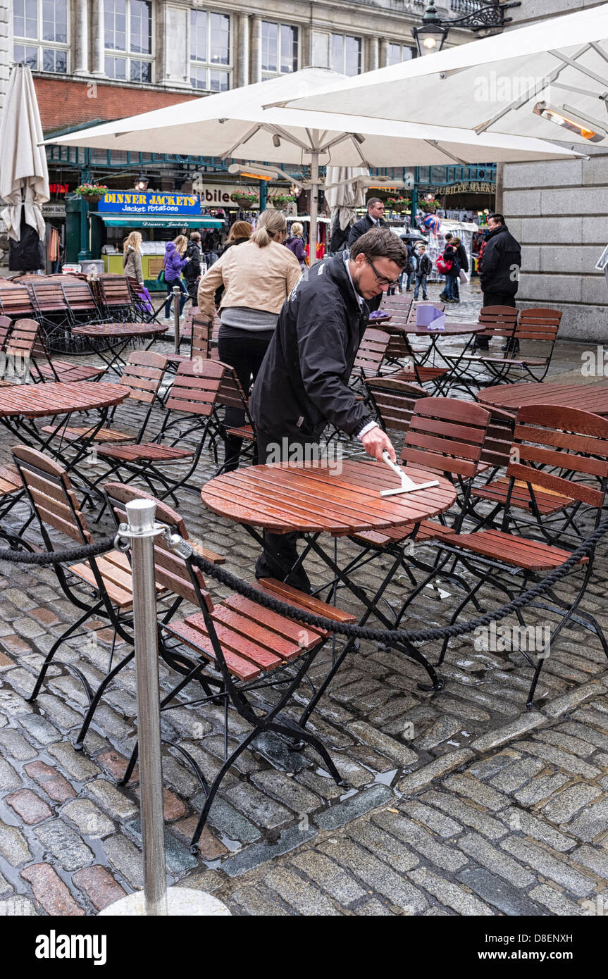 24/05/2013 Wiping down tables at Covent Garden, London. Picture by ...