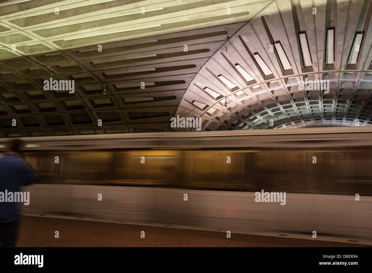 Departing train under intersection of ceiling vaults, Metro Center ...
