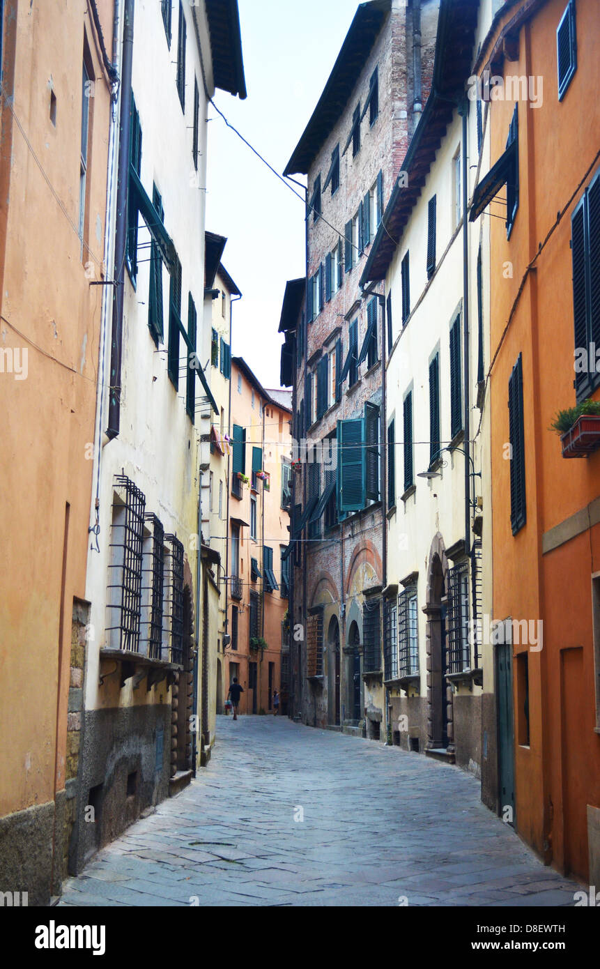 Narrow and old street or alley in italian town. Historical view of ...