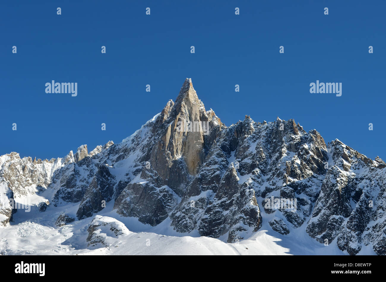 Chamonix, France: the Aiguilles mountain range peaks and blue sky Stock ...