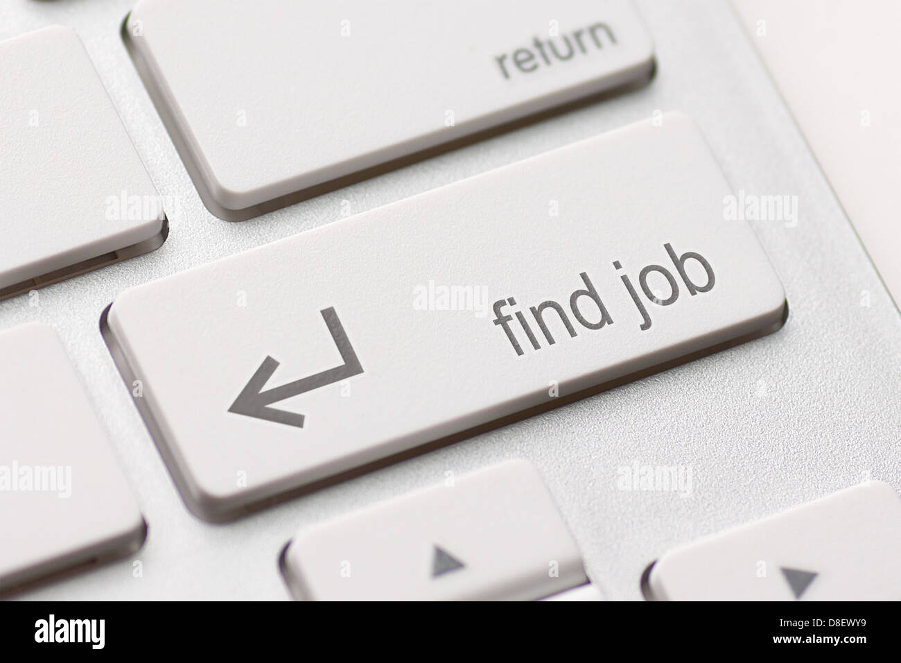 find job enter button key on white keyboard Stock Photo - Alamy