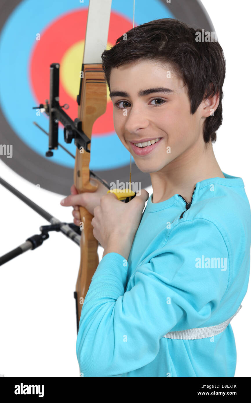 boy practicing archery Stock Photo - Alamy