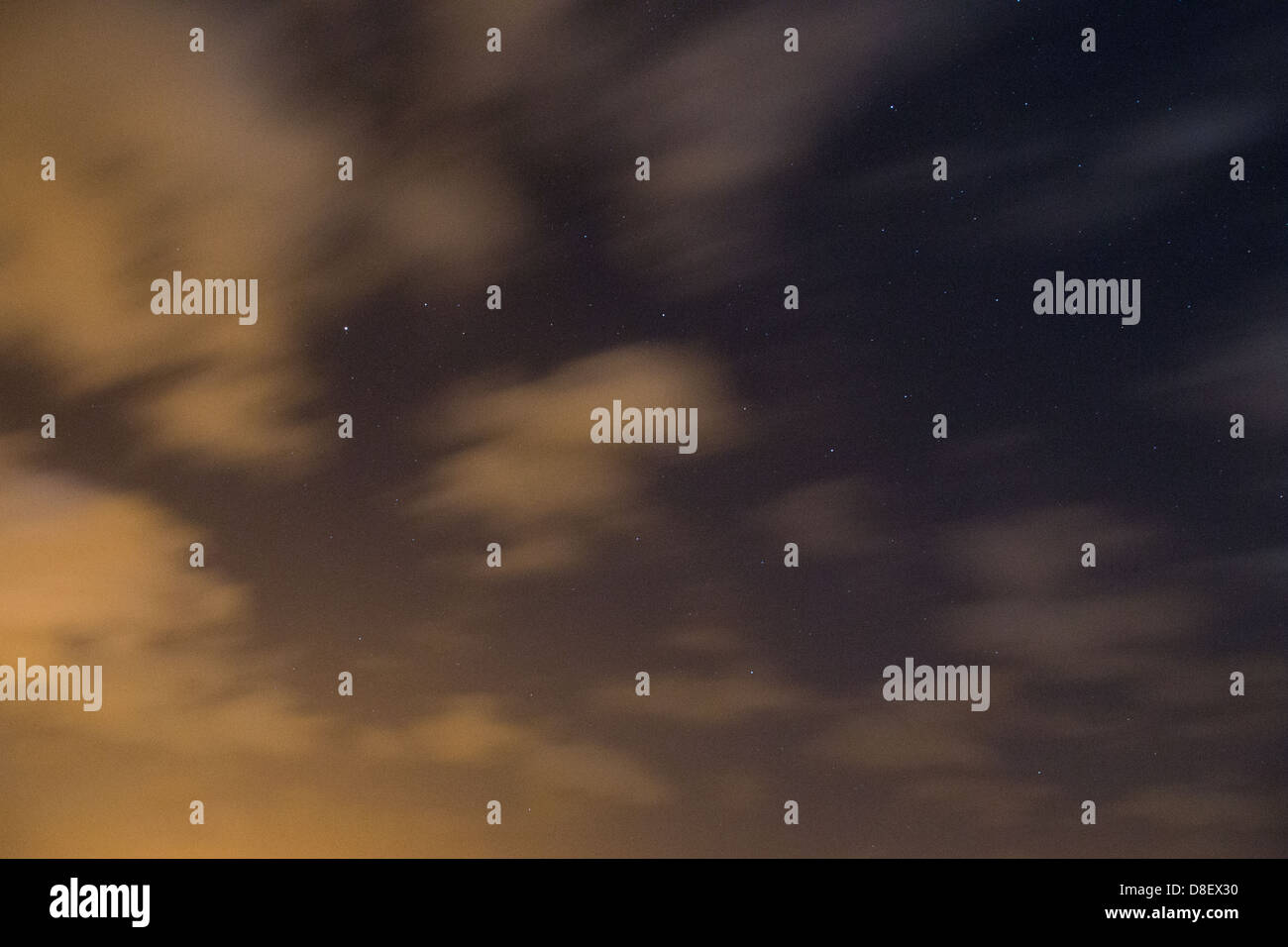 Long exposure shot of the nights sky. Stars shining through with some ...