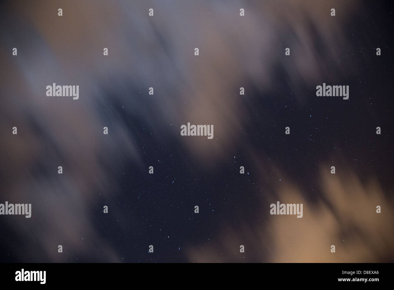 Long exposure shot of the nights sky. Stars shining through with some ...