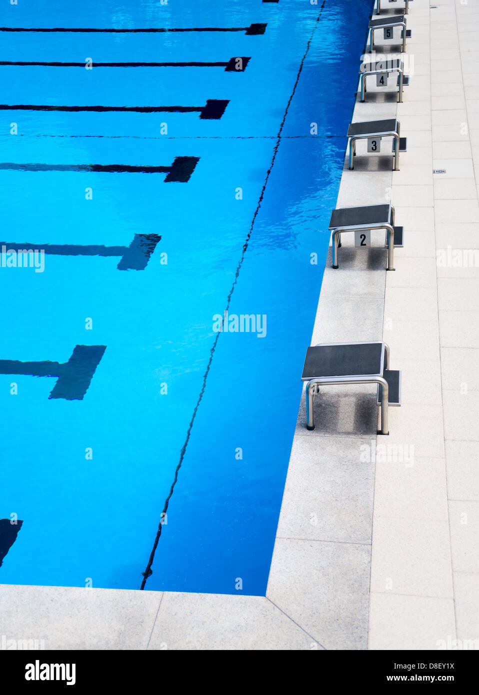 Starting platforms in the outdoor swimming pool Stock Photo - Alamy